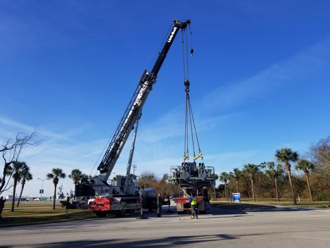 Patriots Point team moved a quad 40 MM gun onto pier leading to U.S.S ...