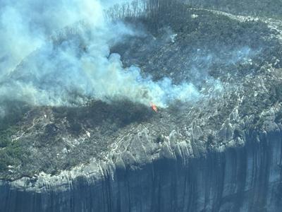 Table Rock mountain wildfire burns 1K acres, homes evacuated