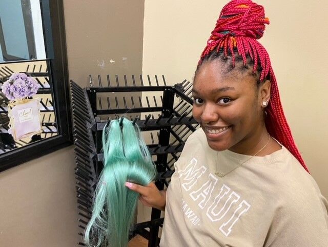 Gamecocks' Most Valuable Braider: Stylist White colors braids of USC ...