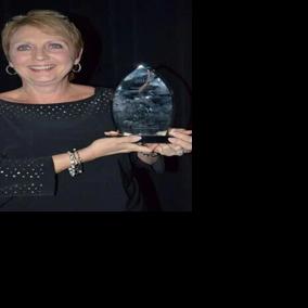 School board honors Diana Floyd with resolution, plaque