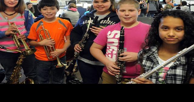 Arts group donates musical instruments to local schools | News ...
