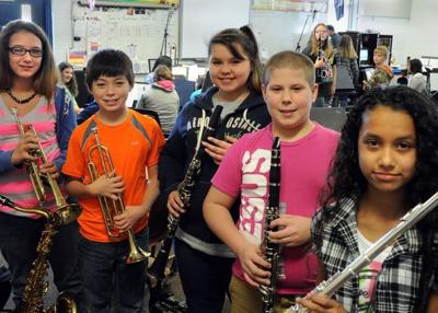 Arts group donates musical instruments to local schools | News ...