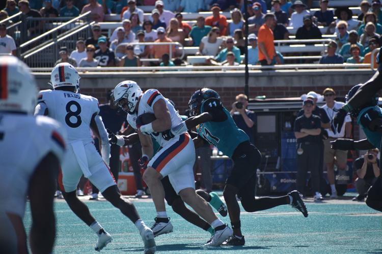 Turnovers doom Coastal Carolina in loss to Virginia