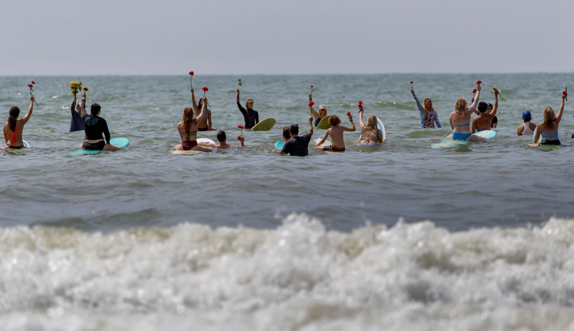 Hundreds gather at Folly Beach for vigil, paddle out for Samantha ...
