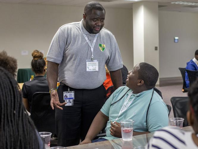 After mother's death, 2 Charleston brothers struggle to make her proud