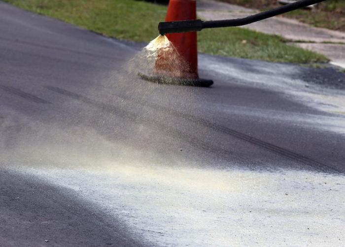 Charleston County tries out a new asphalt treatment meant to cool and clean