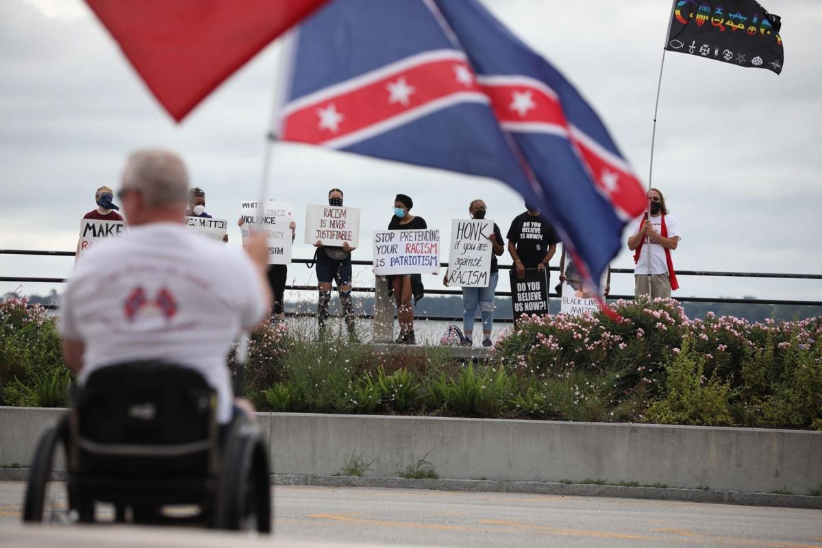 Dozens protest at Charleston Battery to honor victims of Mother Emanuel ...