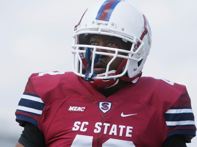 Joe Thomas Sr., 55, makes college football debut