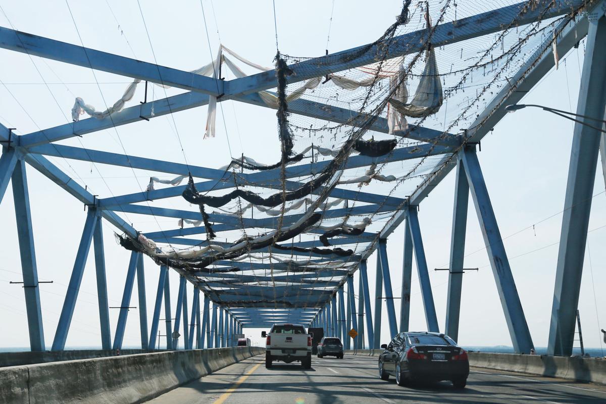 911 caller warned about loose tarp on Don Holt Bridge days before it ...