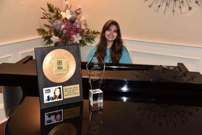 Mount Pleasant singer, songwriter wins international artist award