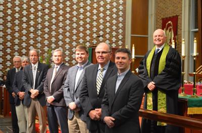 St. John's United Methodist burns a mortgage, celebrates a milestone