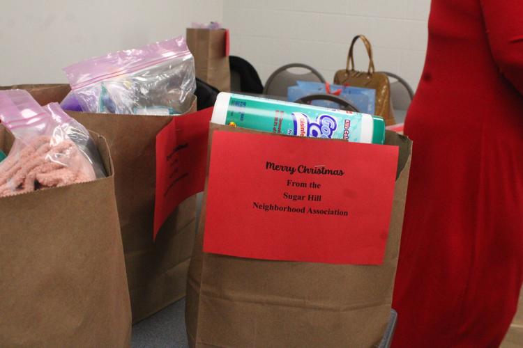 Local group gives back at Smith-Hazel Recreation Center