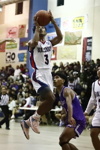 Bulldogs lock up No. 1 seed headed into playoffs, beat GW 71-44 | Local ...