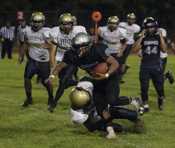 Simon Sanchez Sharks torch Tiyan Titans | Local Sports | postguam.com