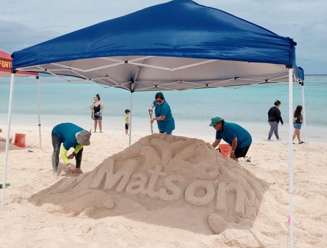 Sculptors bring beach to life in SandFest | Local News | postguam.com
