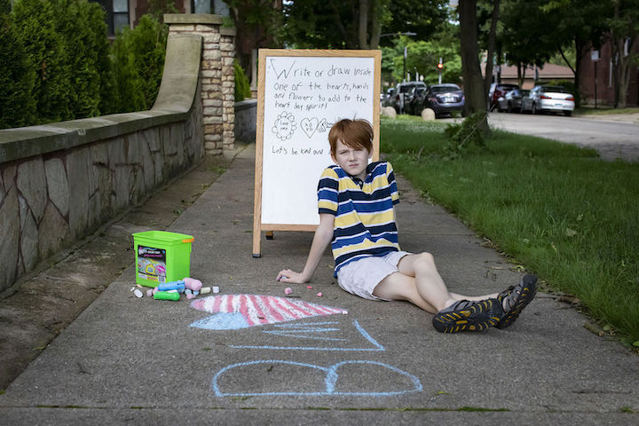 Protesting alone: Chicagoan Aiden Kelley, age 9, is among the solo ...
