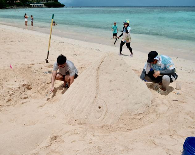 Sculptors bring beach to life in SandFest | Local News | postguam.com