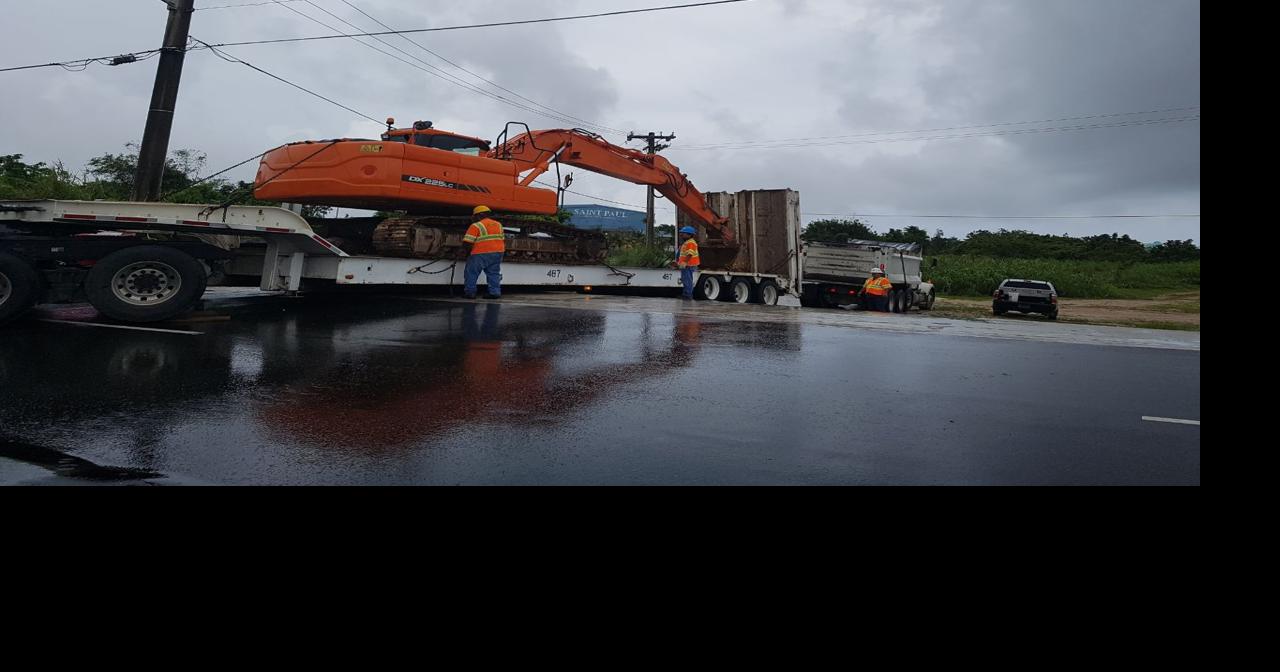 Stuck vehicle blocks traffic in front of Saint Paul | Guam News ...