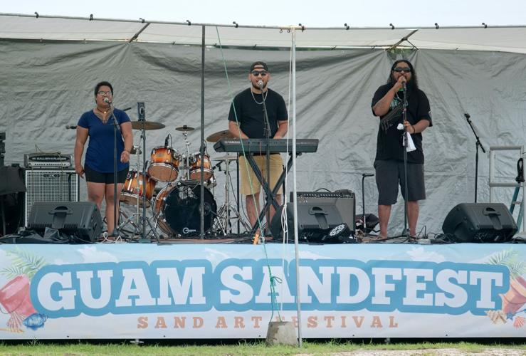 Sculptors bring beach to life in SandFest | Local News | postguam.com