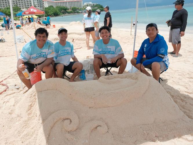 Sculptors bring beach to life in SandFest | Local News | postguam.com