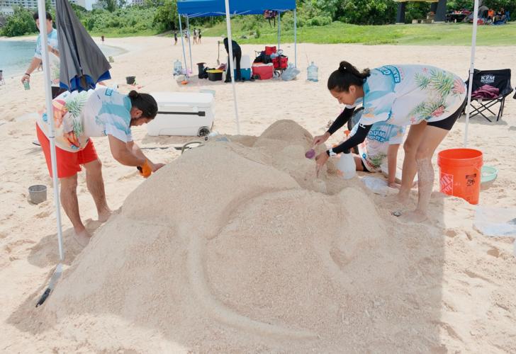 Sculptors bring beach to life in SandFest | Local News | postguam.com