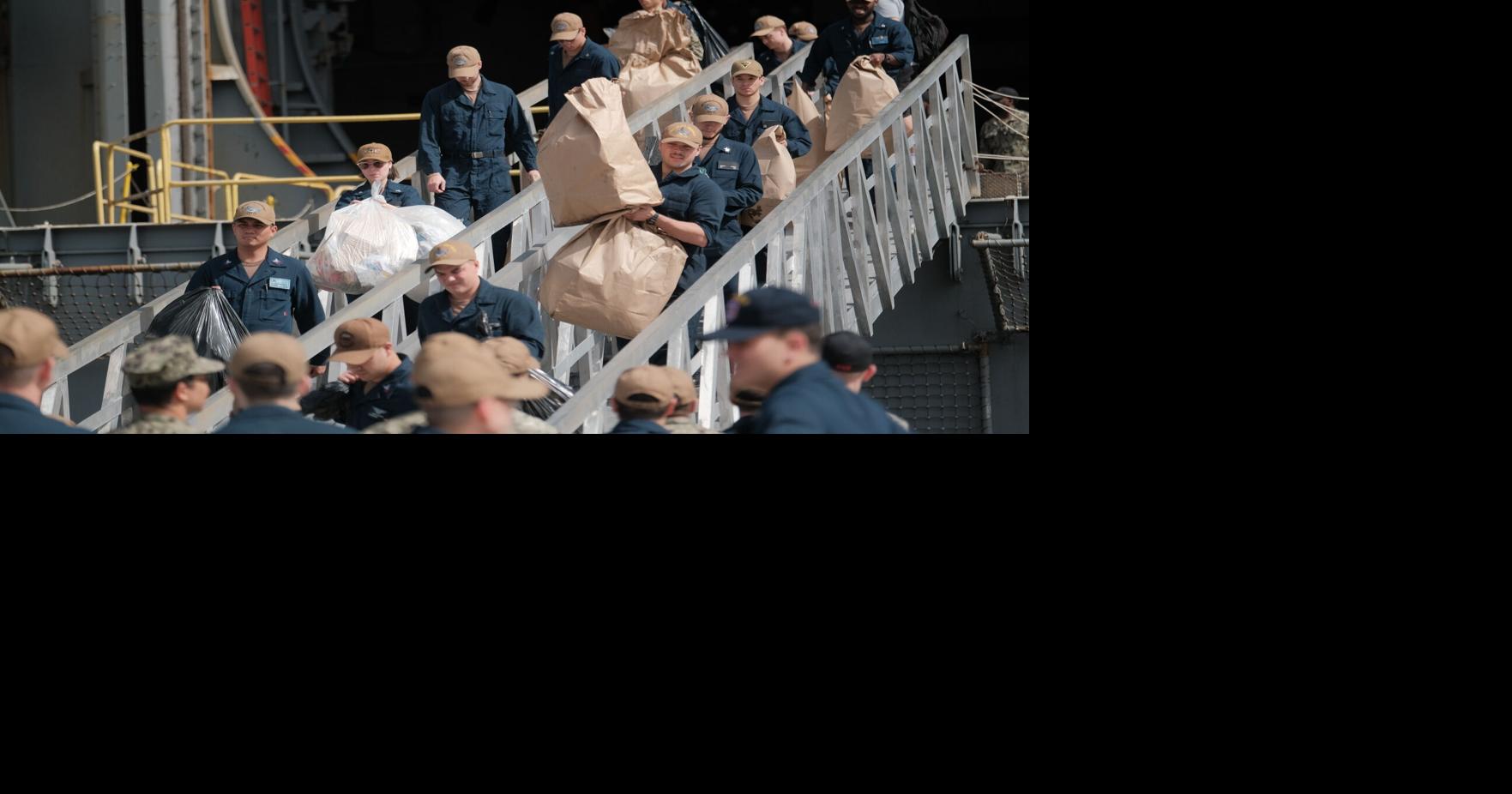 USS Theodore Roosevelt brings 6,000 sailors, locals back to Guam ...