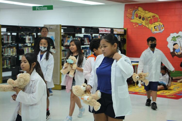 M.U. Lujan students become doctors for a day with Teddy Bear Island ...