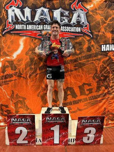 Ambrose slices through jiujitsu competition in Hawaii, receives 2 belts ...