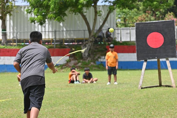 Kids brave the heat in CHamoru sling competition for fun, culture ...