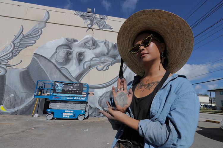 'Caratoes' paints message of hope | Local News | postguam.com
