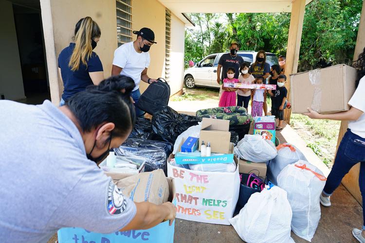 Serve Guam Commission, AmeriCorps aid family in need after house fire ...