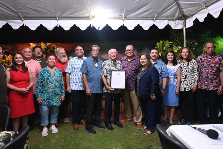 Former Gov. Carl T.C. Gutierrez receives a medal from the Japanese ...