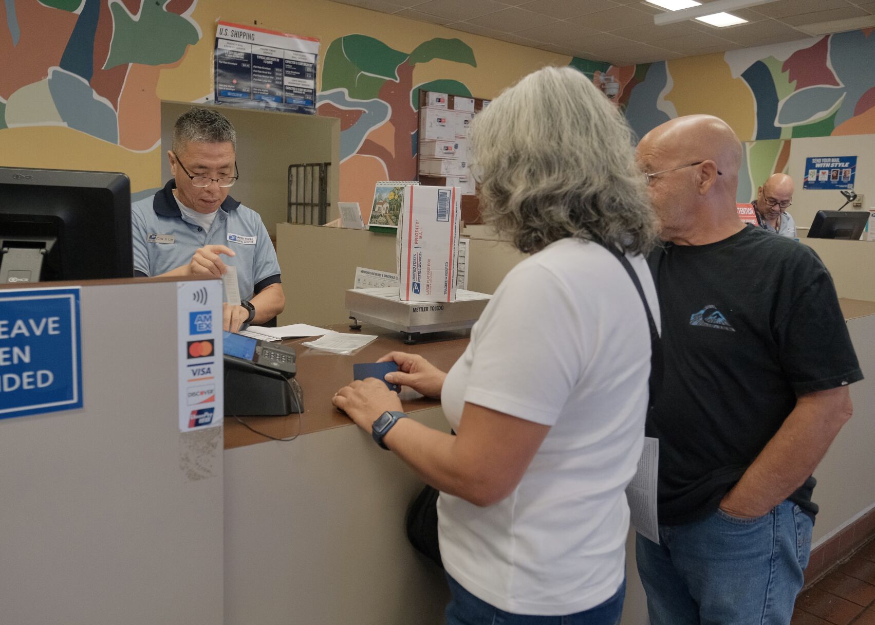 USPS: Mailed packages moving again, future costs still unclear | Local ...