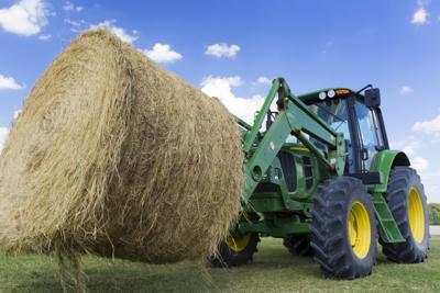 HANDLING LARGE ROUND BALES | | pottcotimes.com