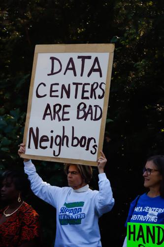 Photo_News_hated data centers_protester.jpg | | princewilliamtimes.com