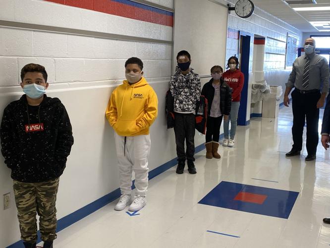 Quiet hallways, small classes greet students returning to schools ...