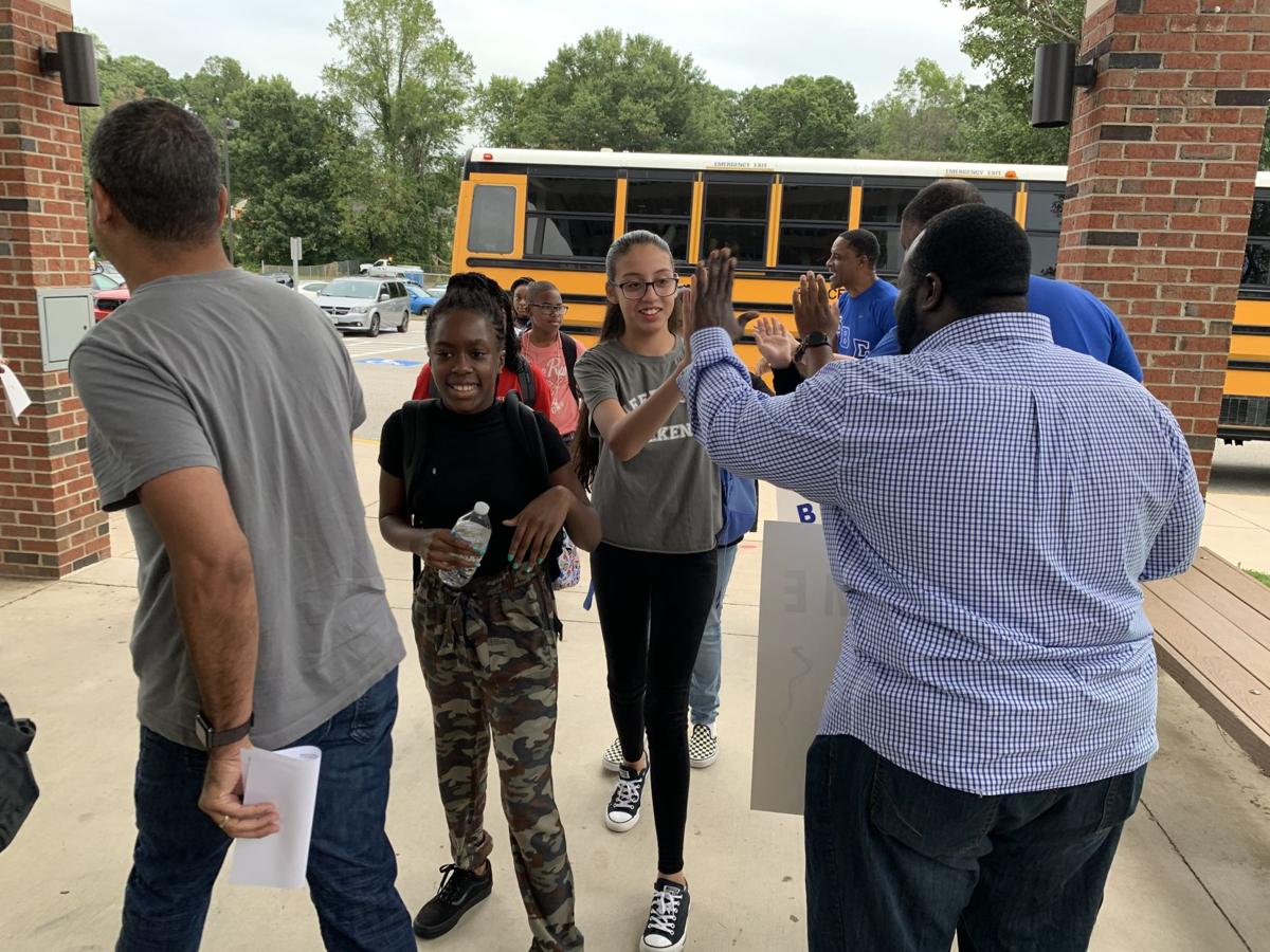 PHOTOS: Welcome back! Volunteers greet Rippon Middle School students on ...