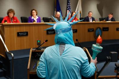 Protesters flood board of supervisors meeting to target Corey Stewart ...