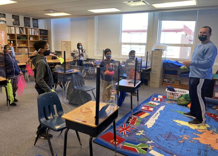 Quiet hallways, small classes greet students returning to schools ...