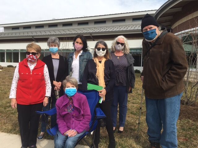 Volunteers plant pollinator garden at the Haymarket-Gainesville Library ...