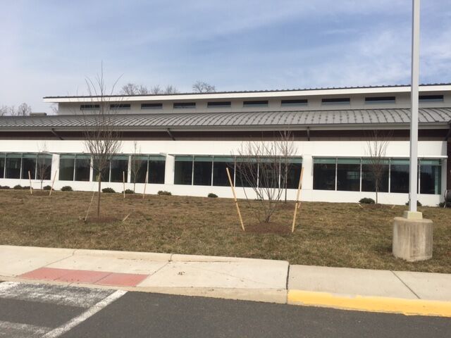 Volunteers plant pollinator garden at the Haymarket-Gainesville Library ...