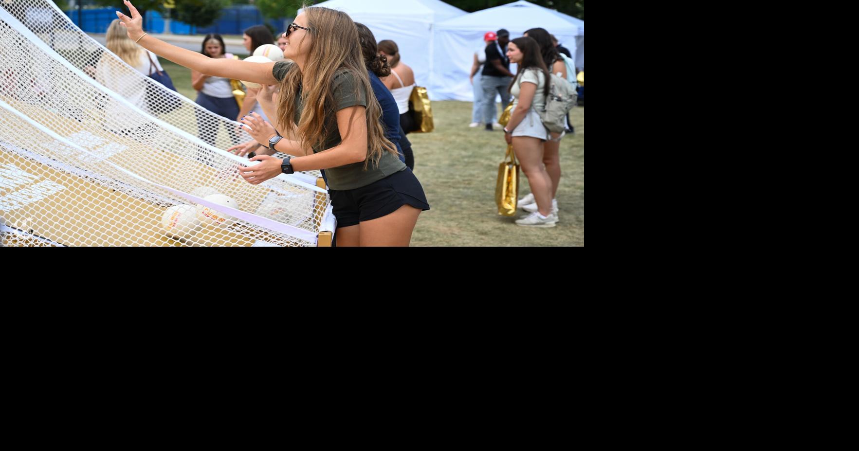 Uber One Pop-up, Girl Throws | | psucollegian.com