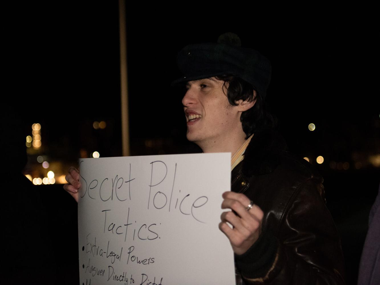 1/12 ICE Protest, Man holds sign | | psucollegian.com