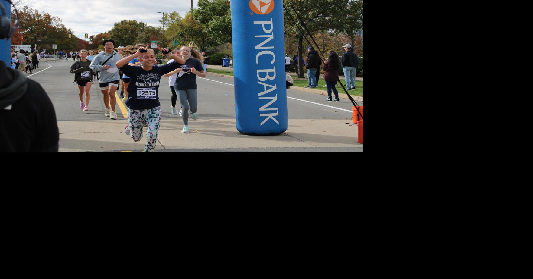 Penn State Thon 5K powered by PNC, Female Participant crosses the ...