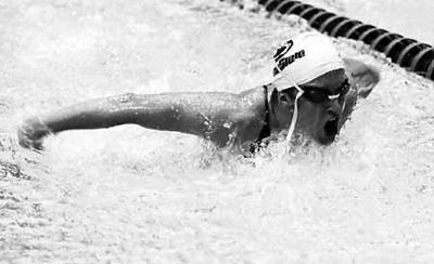 Photo: Arianne Adams competing at McCoy Natatorium | Archived News ...