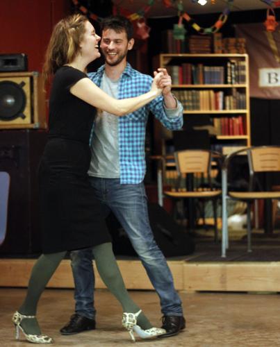 Megan Baumann (graduate-geography) laughs while dancing ...