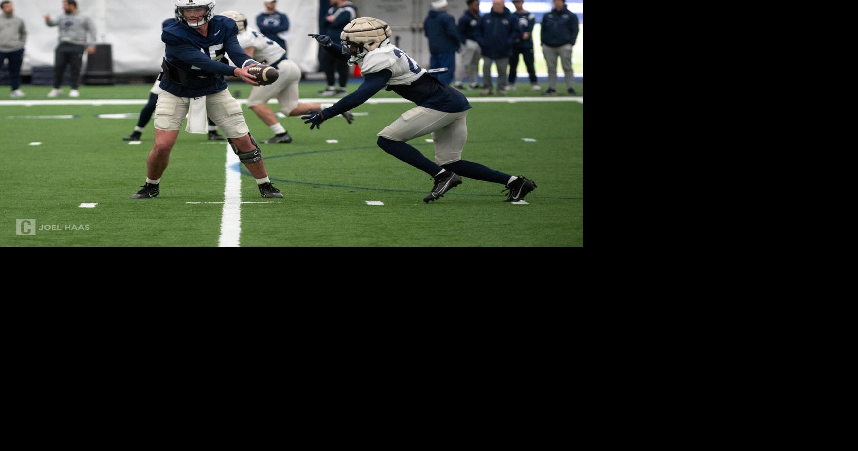 Football practice, hand-off | | psucollegian.com