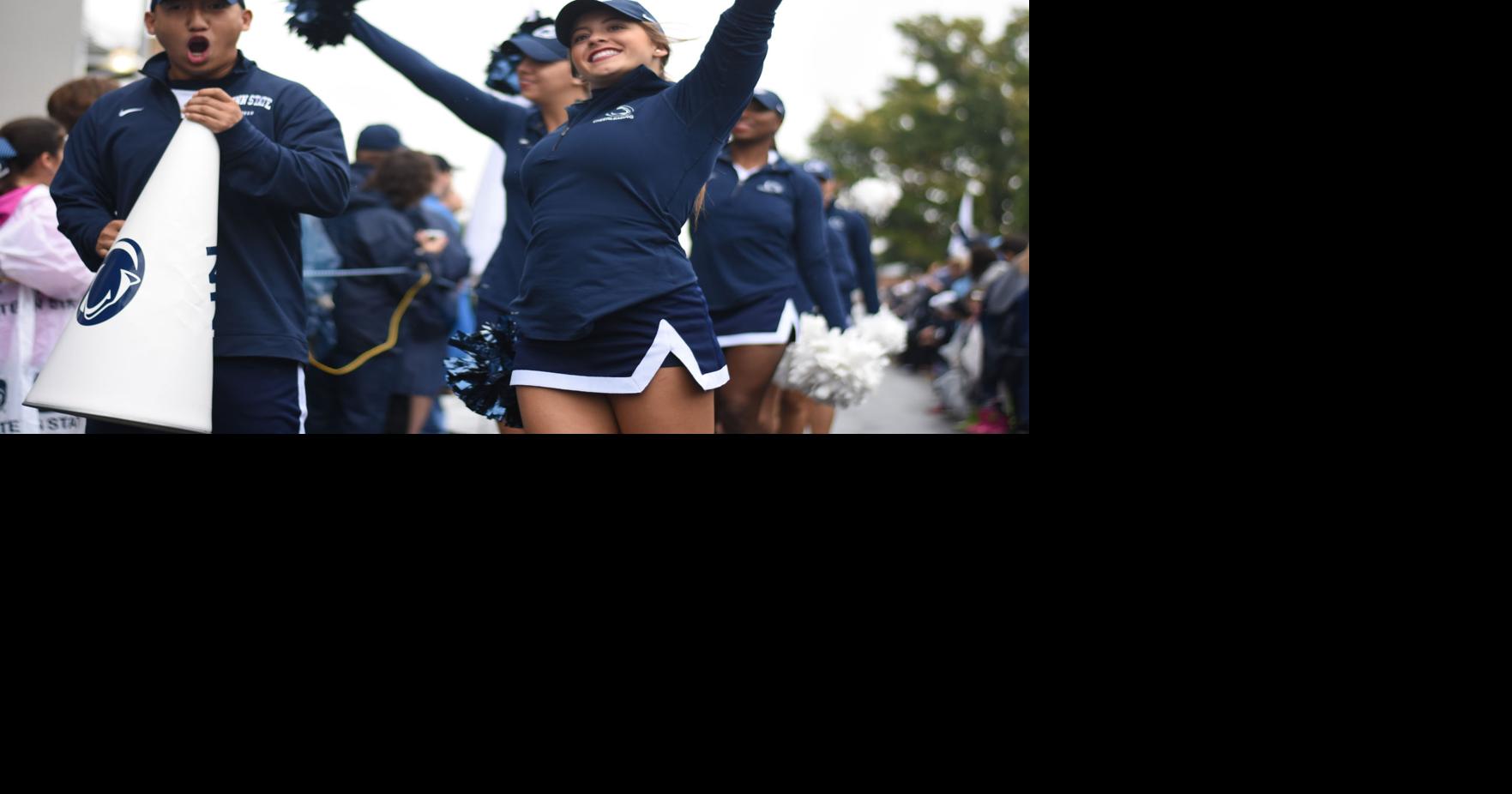 Cheerleading hurdles over barrier with help of International Olympic ...