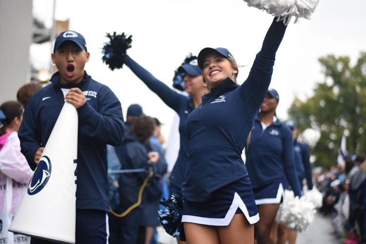 Cheerleading hurdles over barrier with help of International Olympic ...