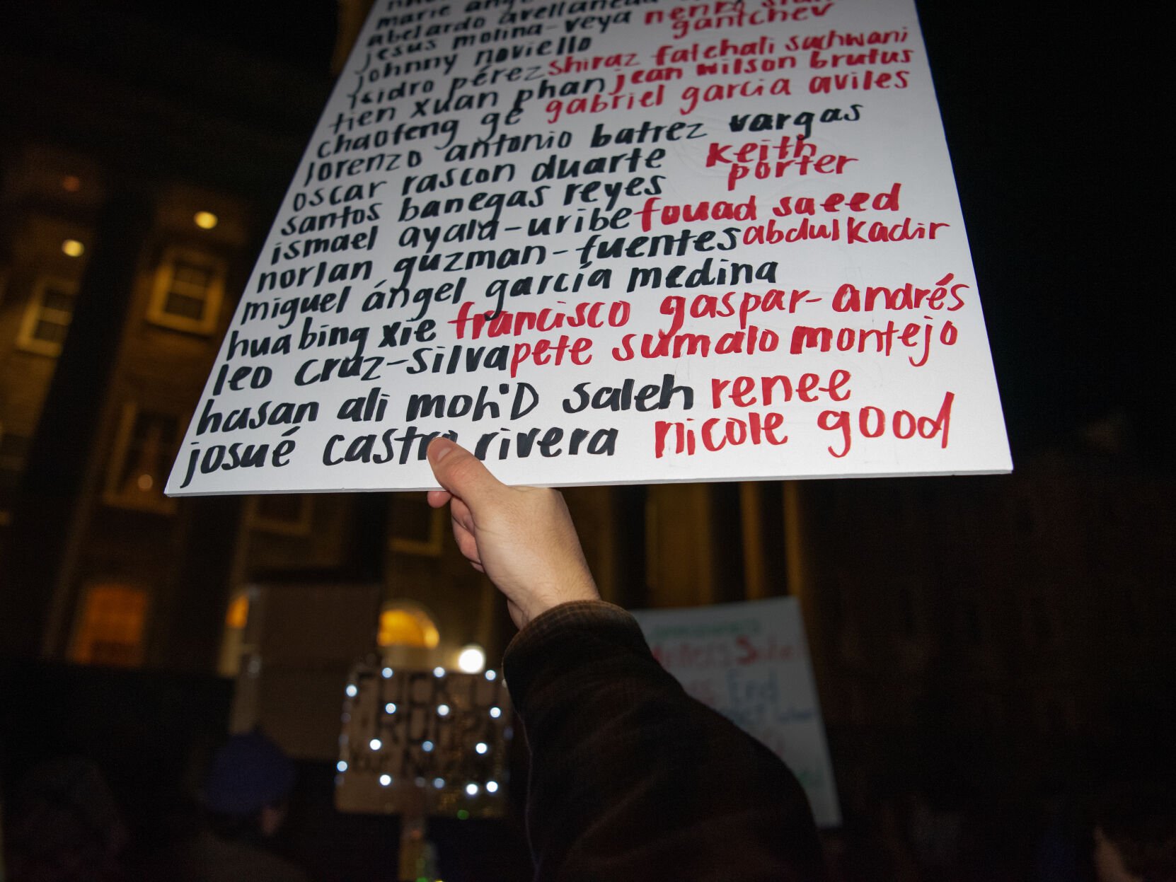 1/12 ICE Protest, Sign with names | | psucollegian.com